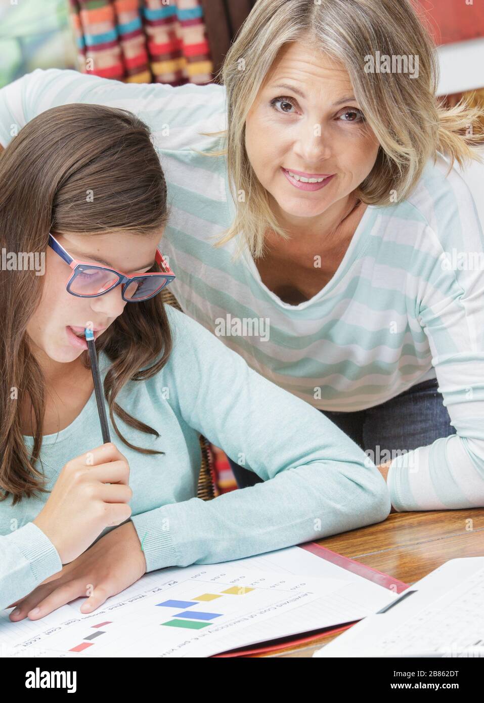 pretty student girl taking tutoring courses with beautiful blond ...