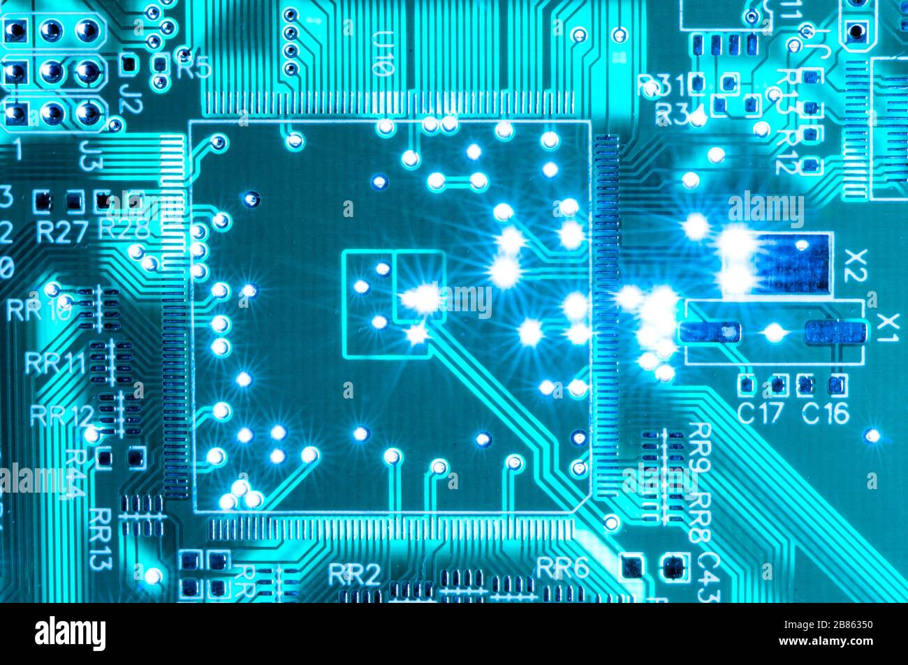 Close up photo of pcb printed circuit board electric with light flash ...