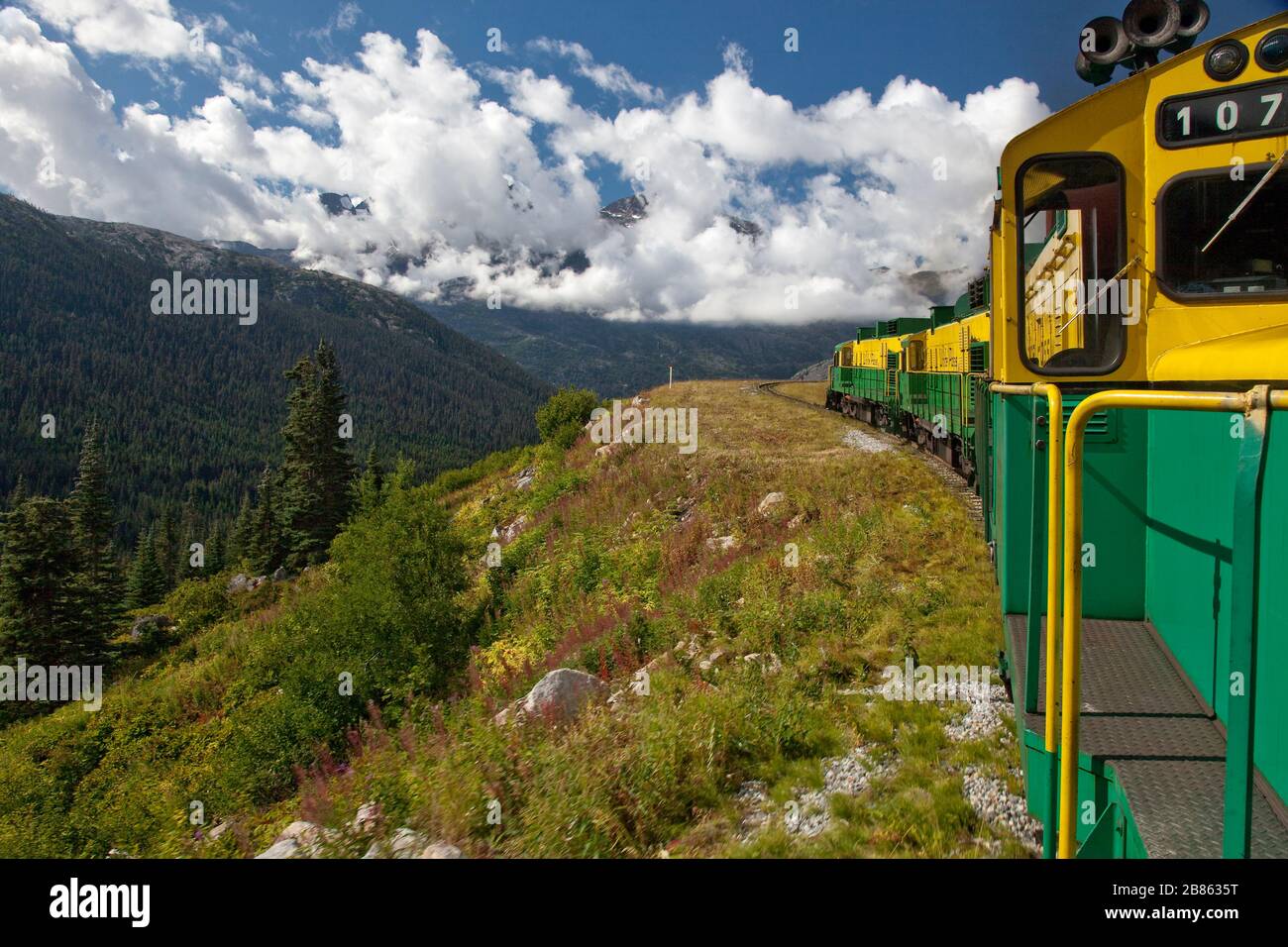 Horizontal and colorful shot of the White Pass train trip, Skagway ...