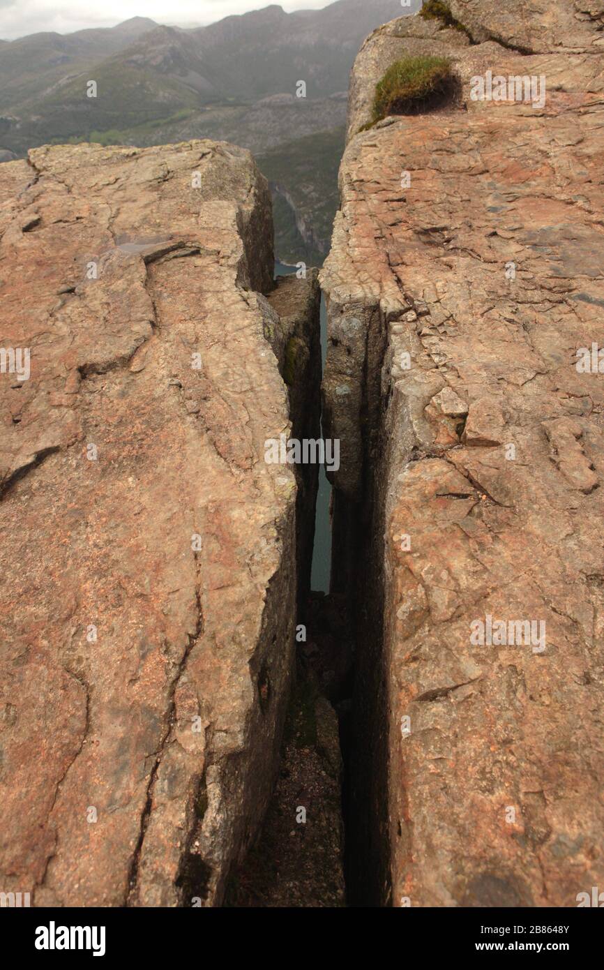 big fault or scratch on the rock. brown rock structure close up. Pile ...