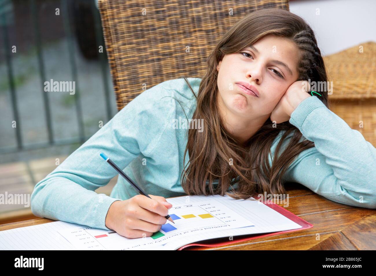 beautiful girl student doing her homework without motivation Stock ...
