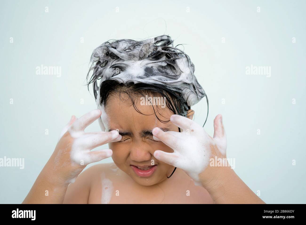 Woman hair shampoo foam face hi-res stock photography and images - Alamy