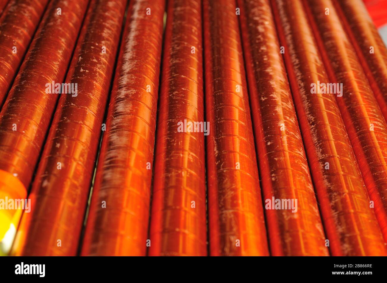 Close-up of a conductors of red copper wire in the kapton insulation ...