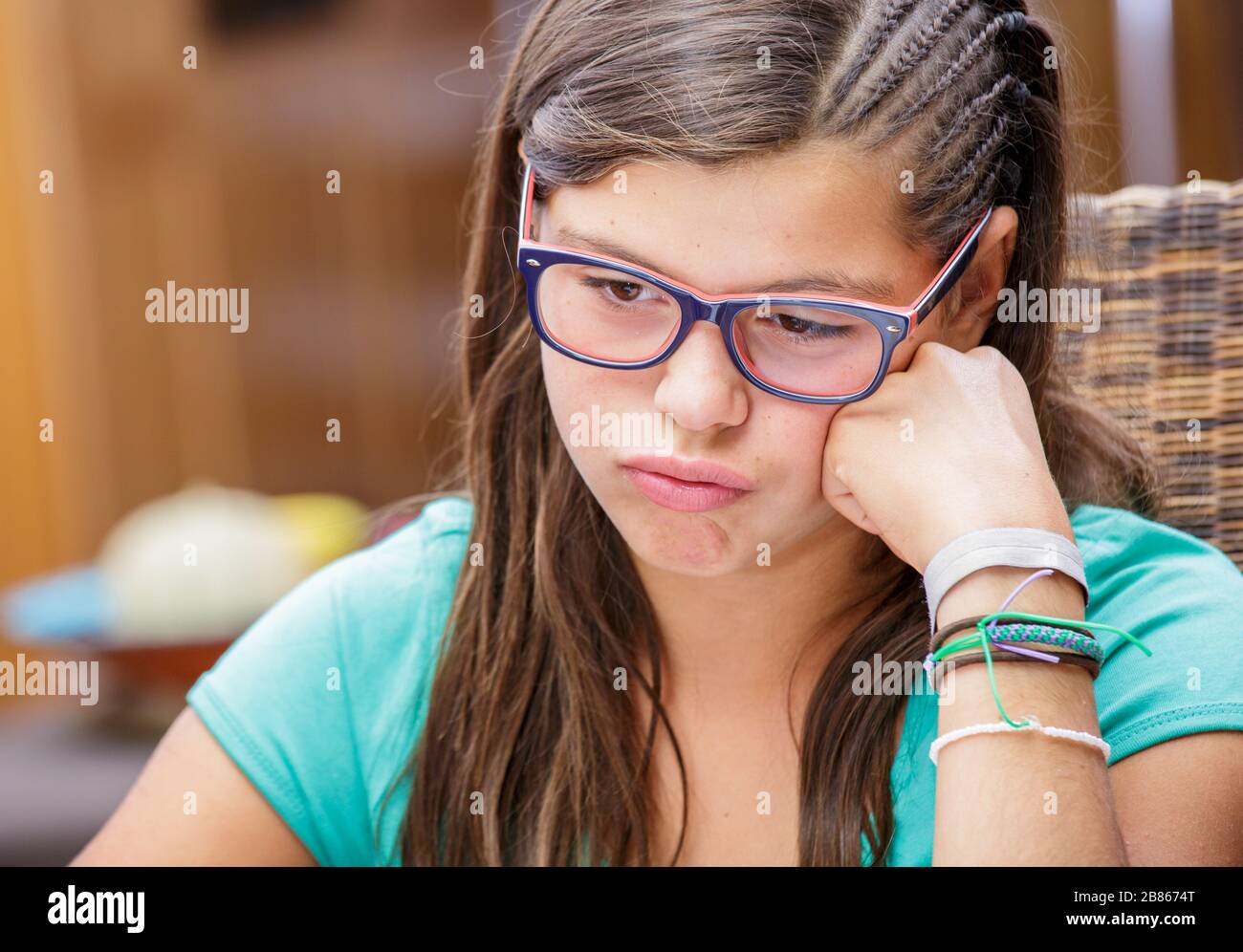 portrait of a young girl disconcerted Stock Photo - Alamy