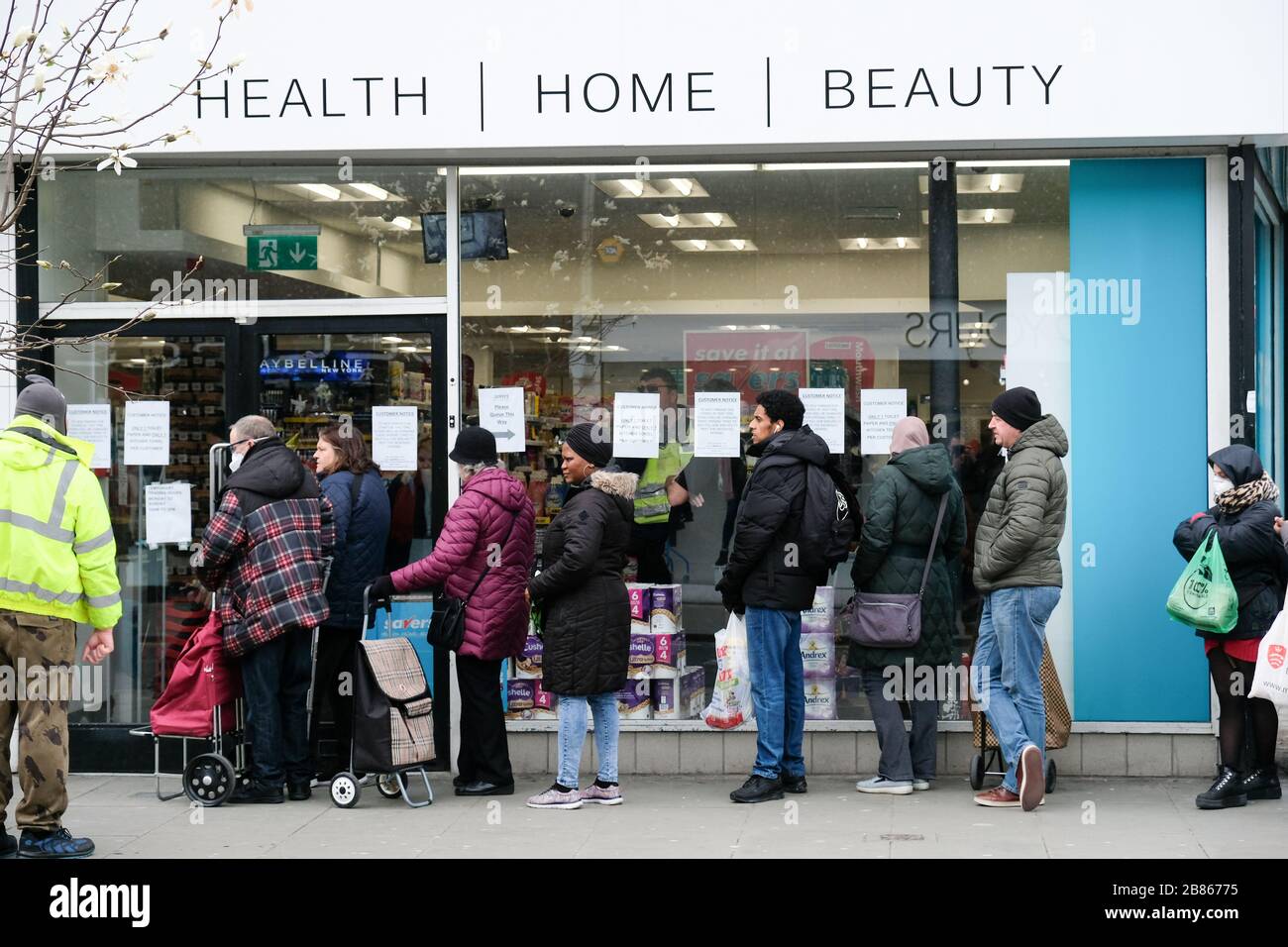 People queuing for toilet hi-res stock photography and images - Alamy