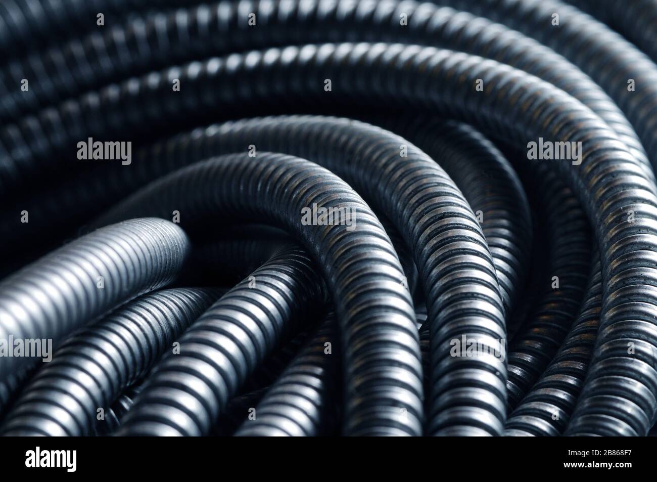 Close-up of a huge bundle of 10mm protective shield coil interconnected ...