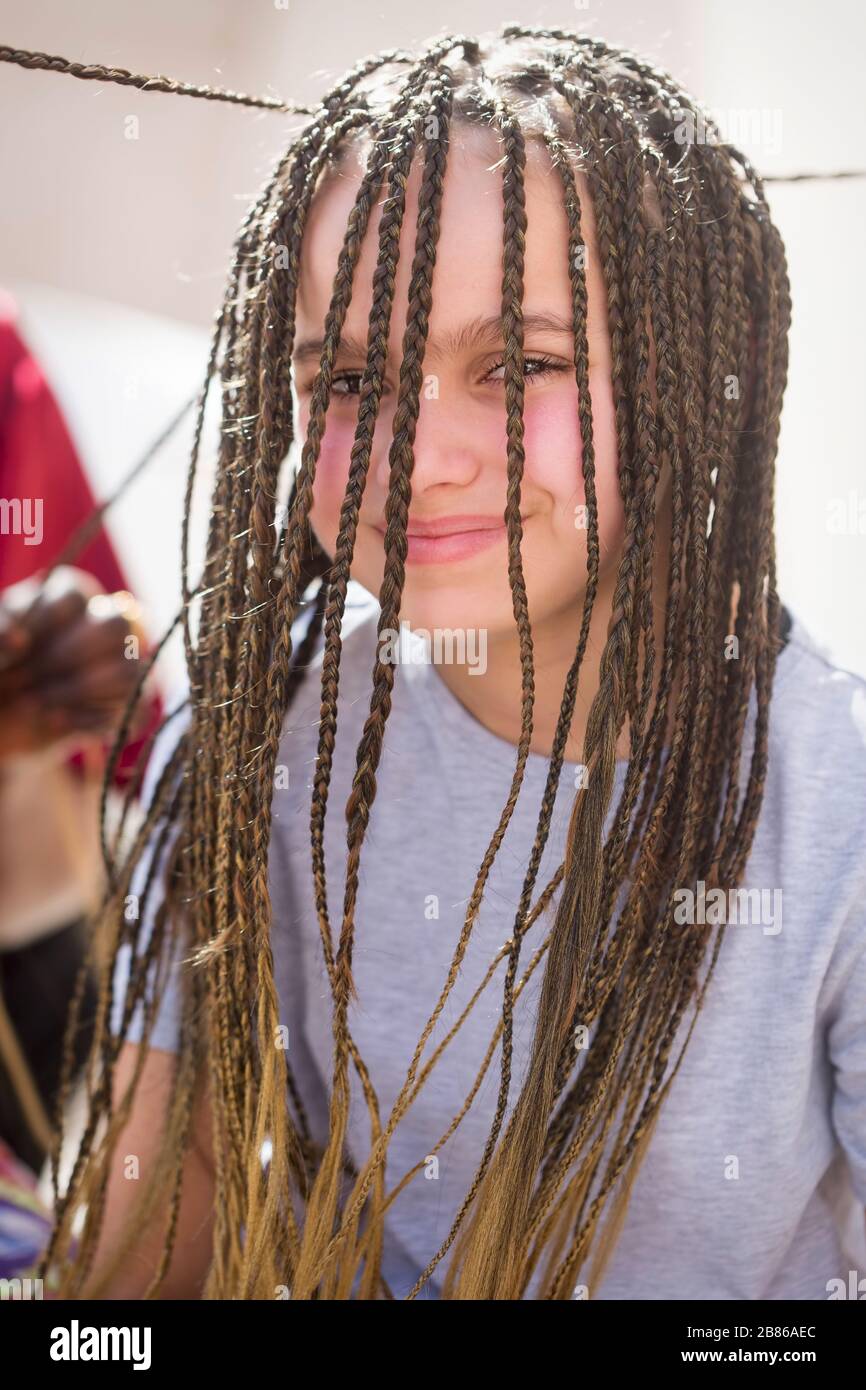 Beautiful girl with braids Stock Photo - Alamy
