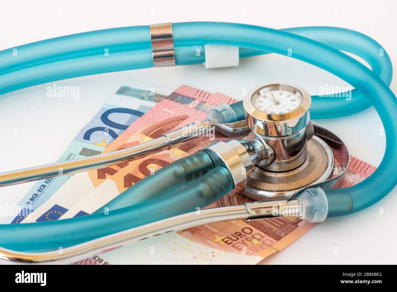 Expensive health treatment. Stethoscope on money background Stock Photo ...
