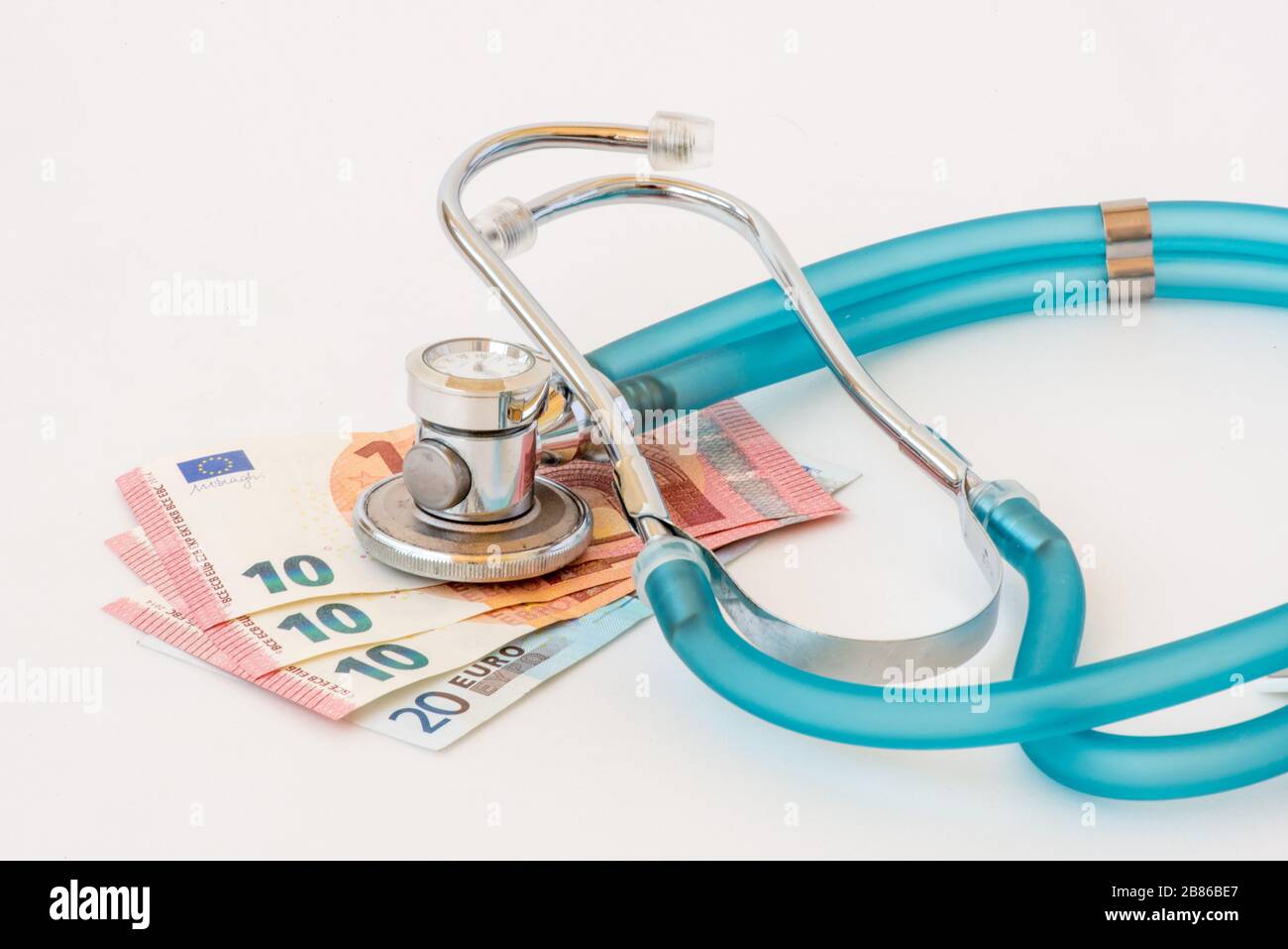 Expensive health treatment. Stethoscope on money background Stock Photo ...