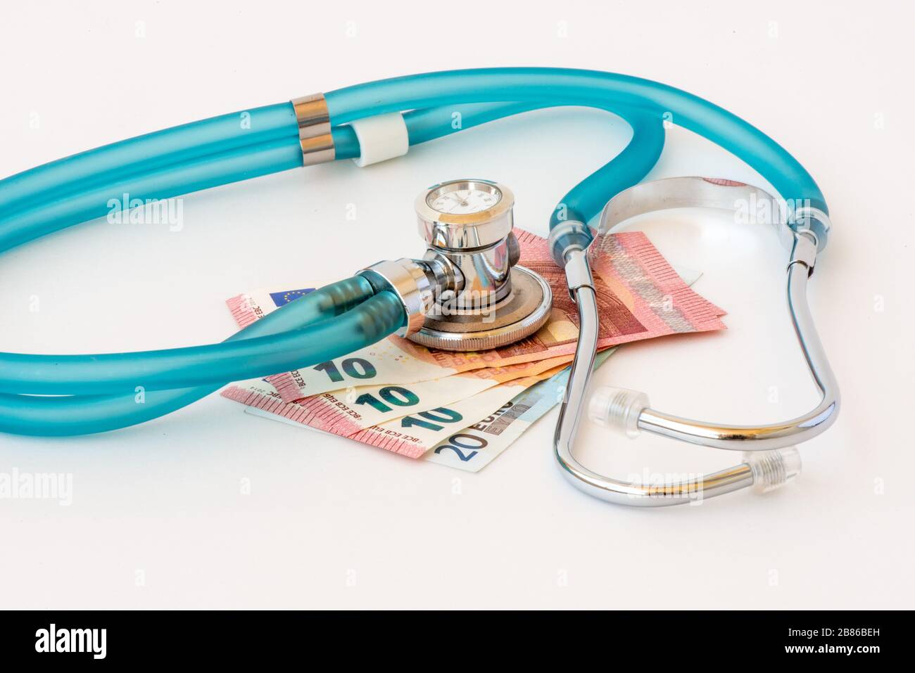 Expensive health treatment. Stethoscope on money background Stock Photo ...