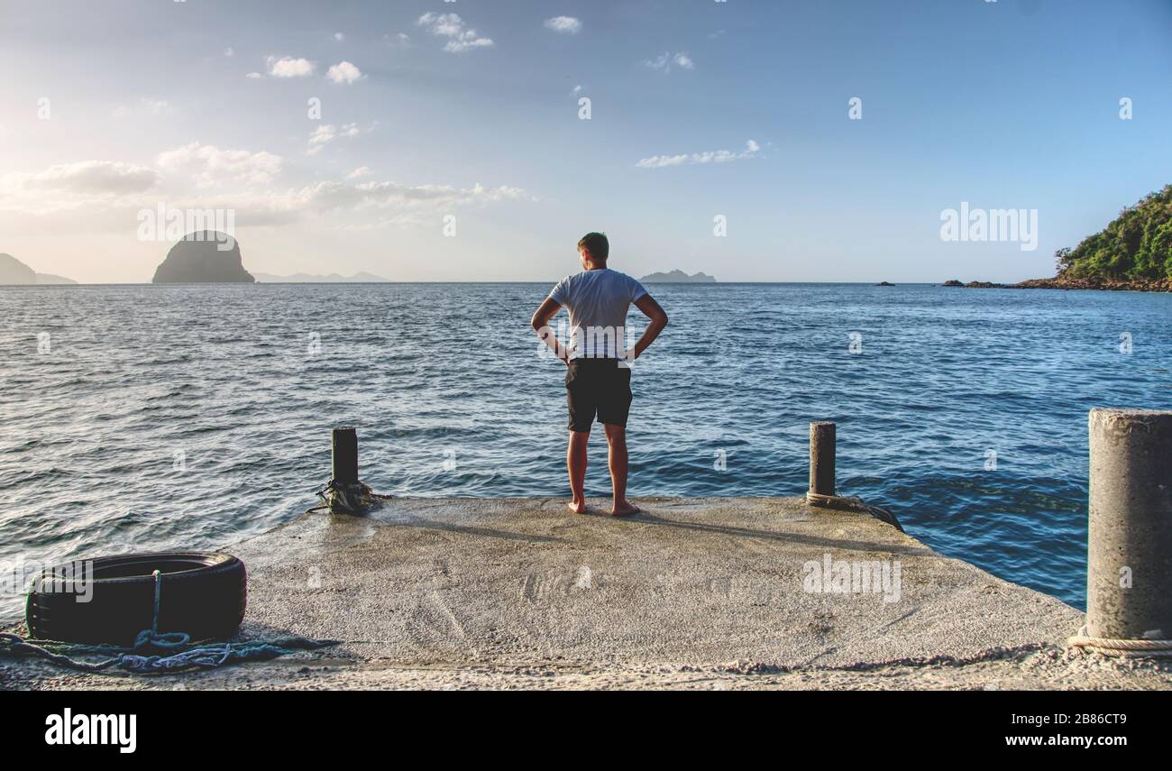 Ko Ngai Hai Island ocean peer view with person Stock Photo - Alamy