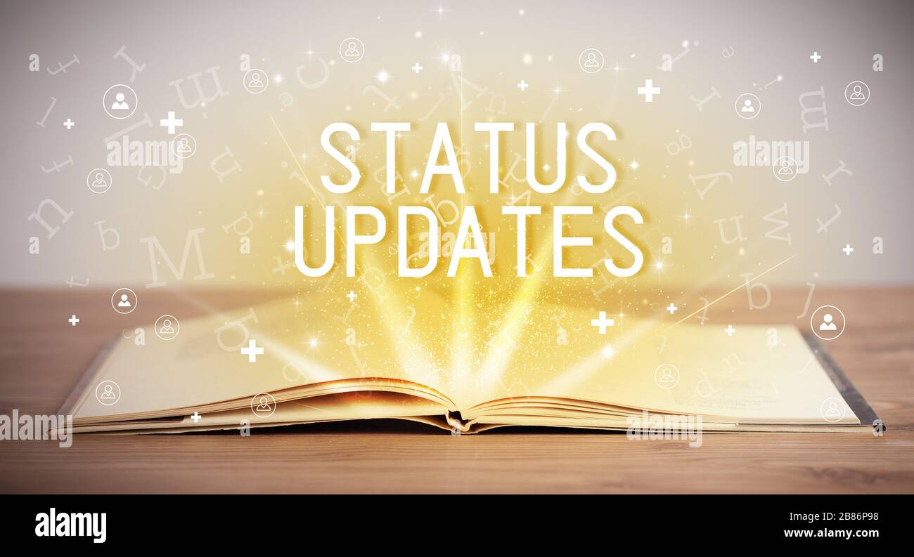 Open book with STATUS UPDATES inscription, social media concept Stock ...