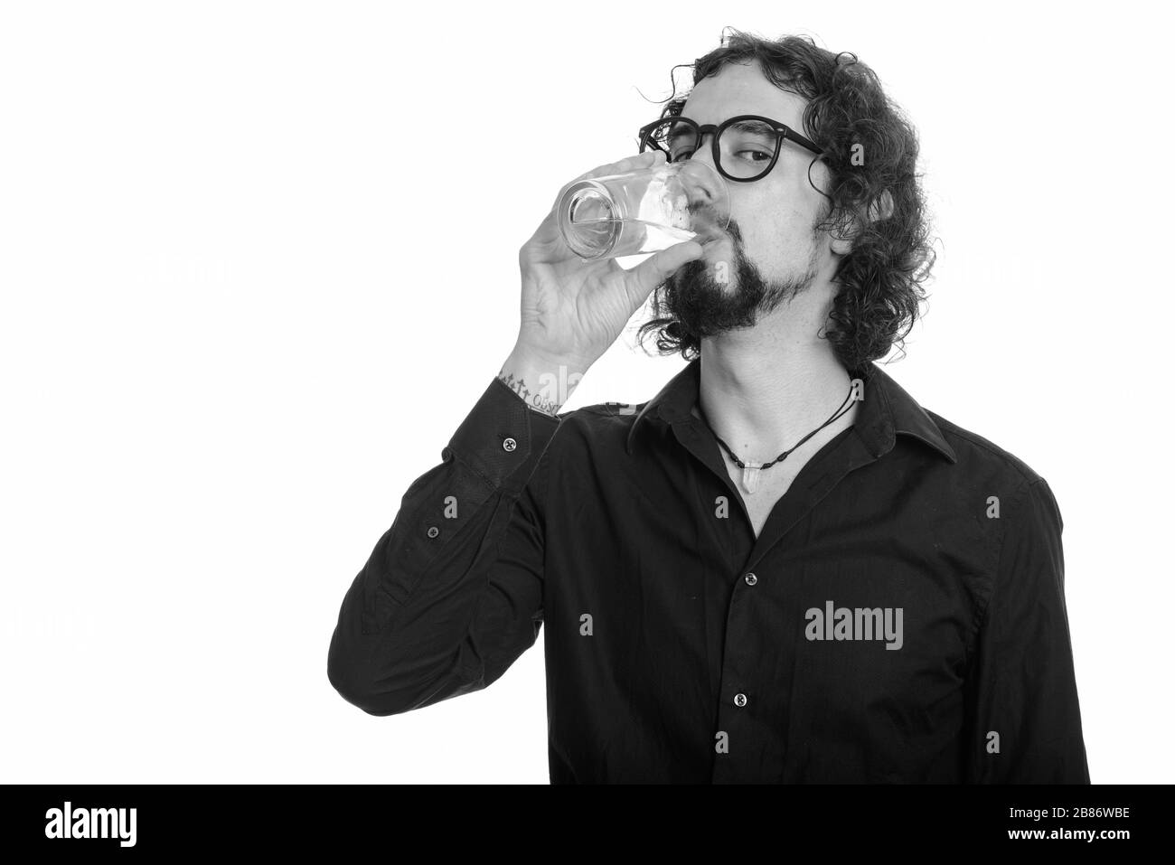 Man drinking water handsome hi-res stock photography and images - Alamy