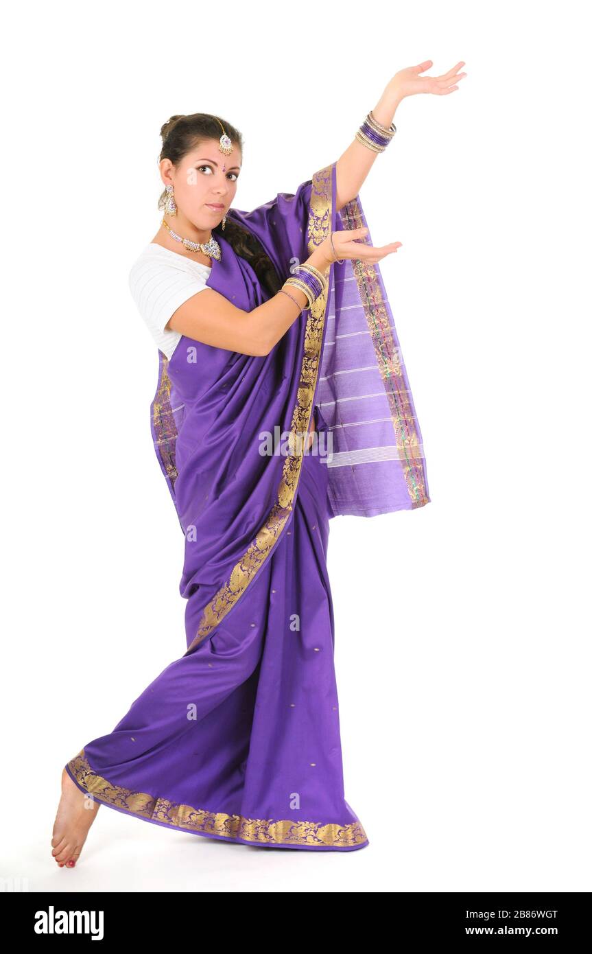 Standing smiling caucasian white woman posing in traditional purple ...