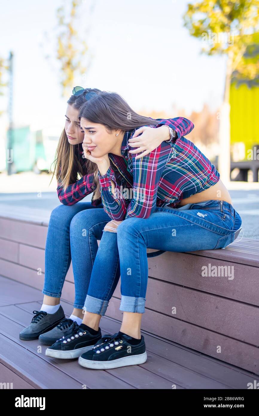 Teen female friend comforting hi-res stock photography and images - Alamy Teen female friend comforting hi-res stock photography and images - Alamy