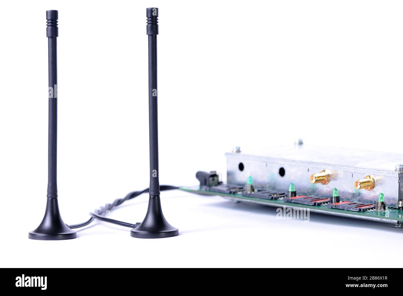 Close-up of an antenna with wires leading to an electronic circuit ...