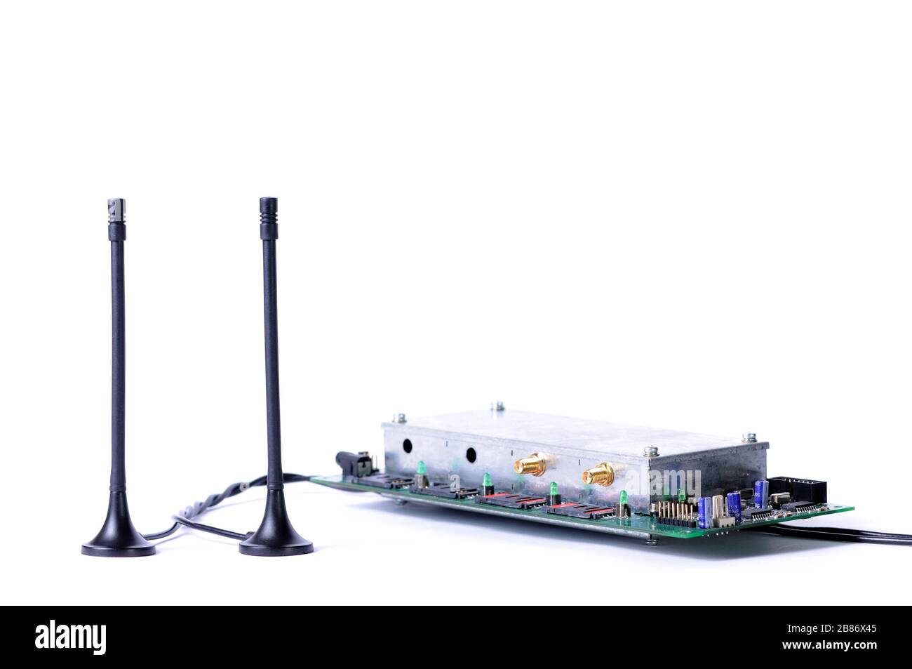 Close-up of an antenna with wires leading to an electronic circuit ...