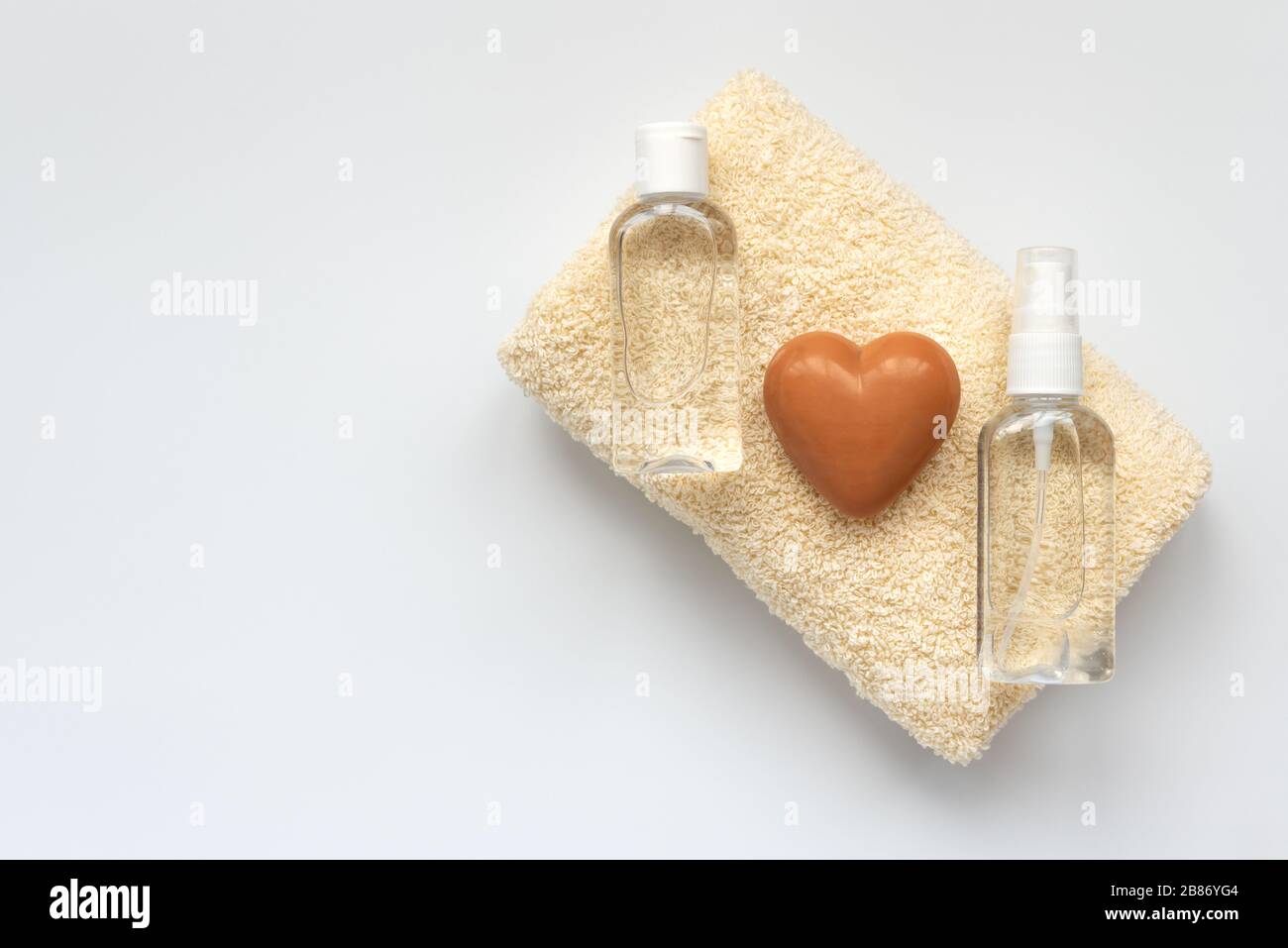 Set of antiseptic items. Bottles of antiseptic hand gel and spray, soap ...