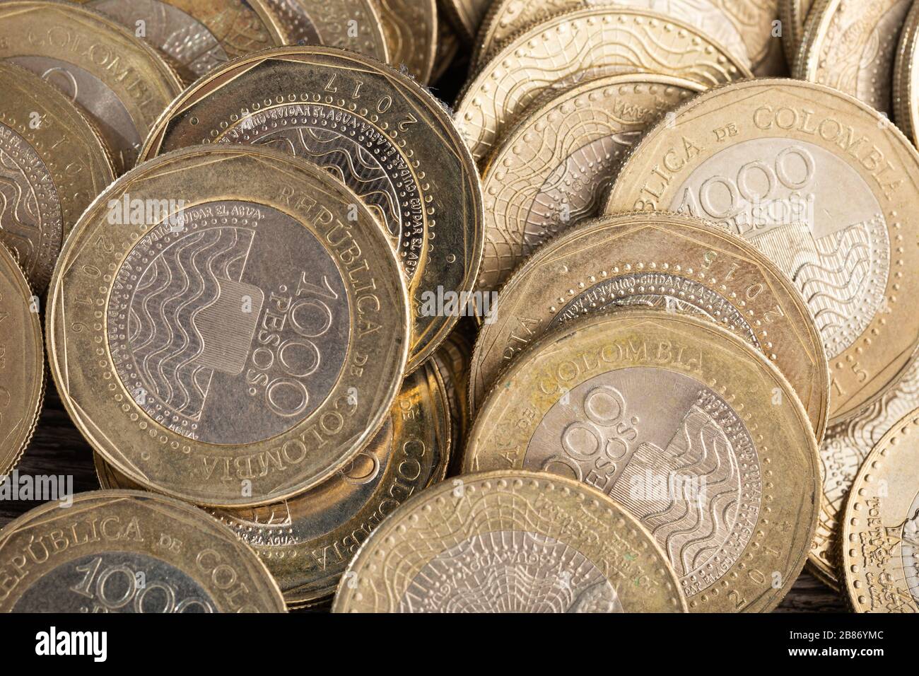 Colombian pesos coins hi-res stock photography and images - Alamy