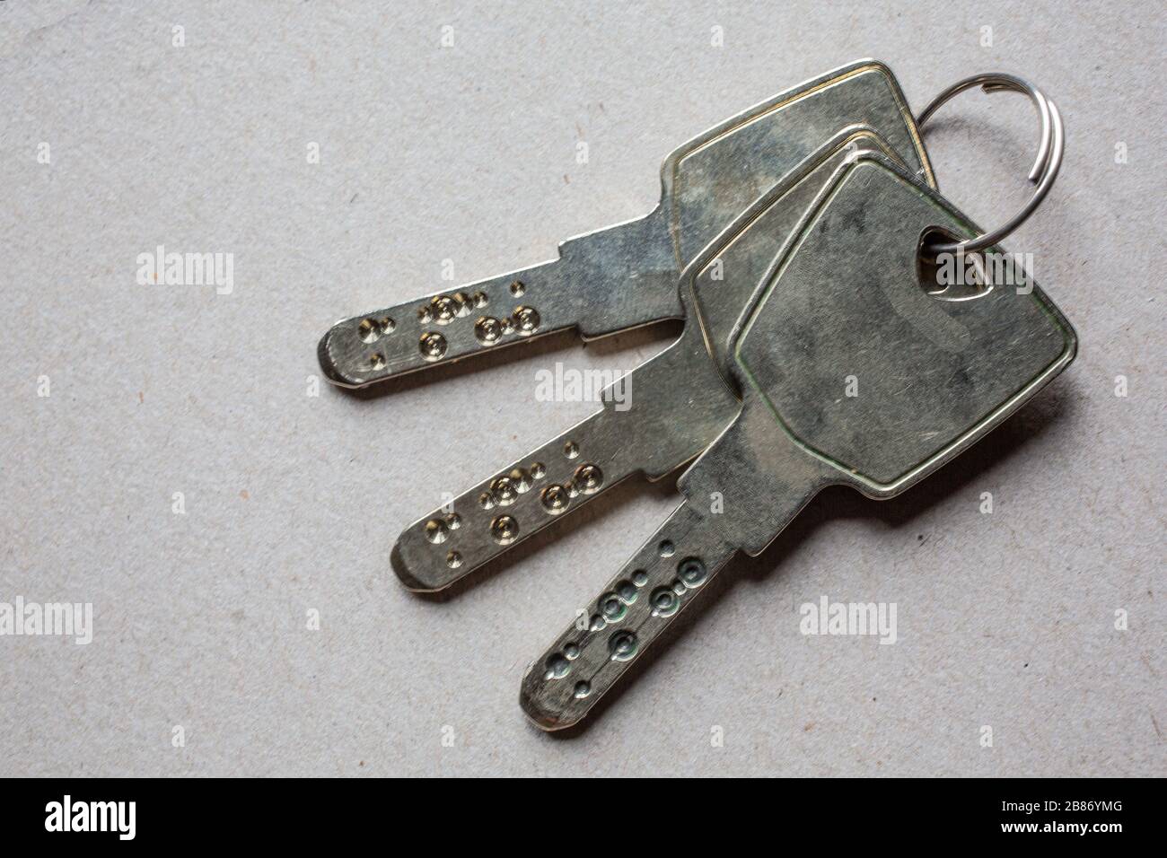 Key for a security locking system Stock Photo - Alamy