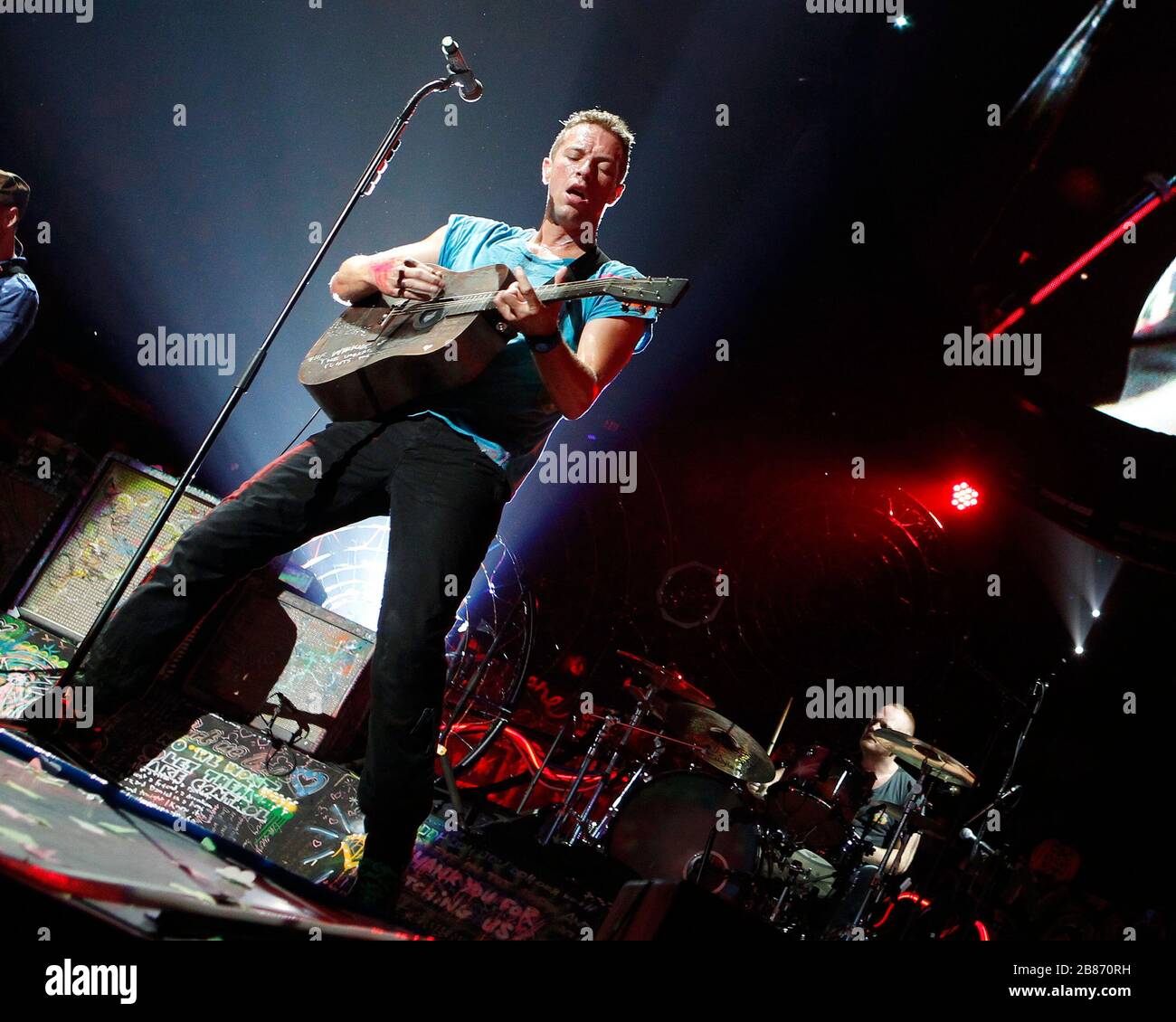 Coldplay frontman Chris Martin performs with the rest of the band at ...