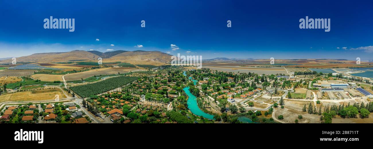 Aerial panorama of Kibbutz Nir David in Northern Israel with orchards ...