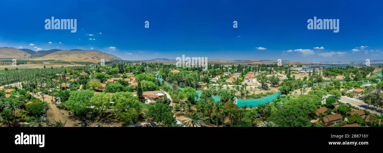 Aerial panorama of Kibbutz Nir David in Northern Israel with orchards ...