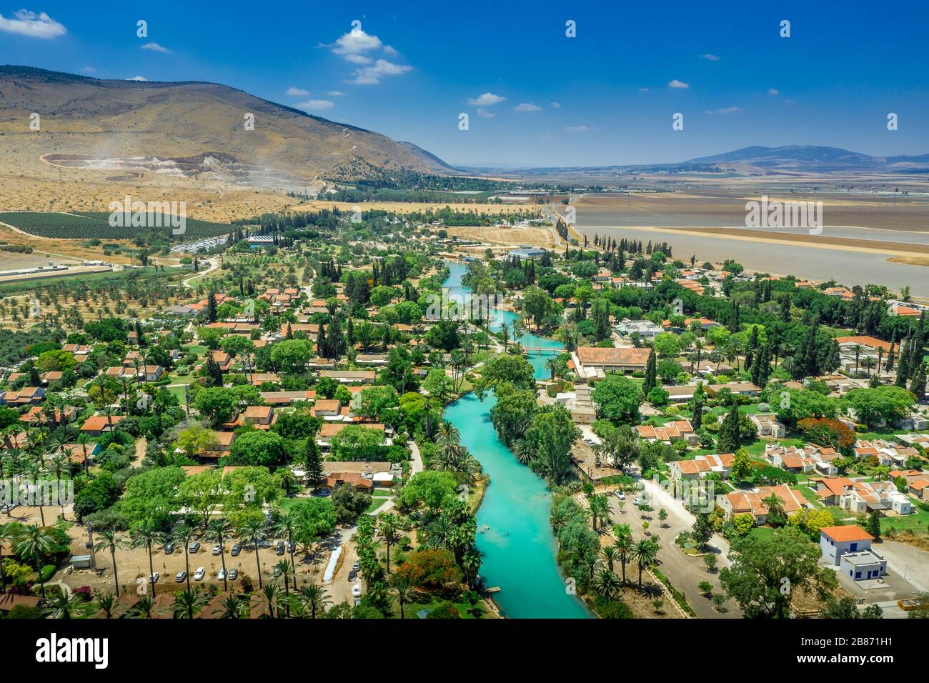 Aerial panorama of turquoise Amal river running through the ...
