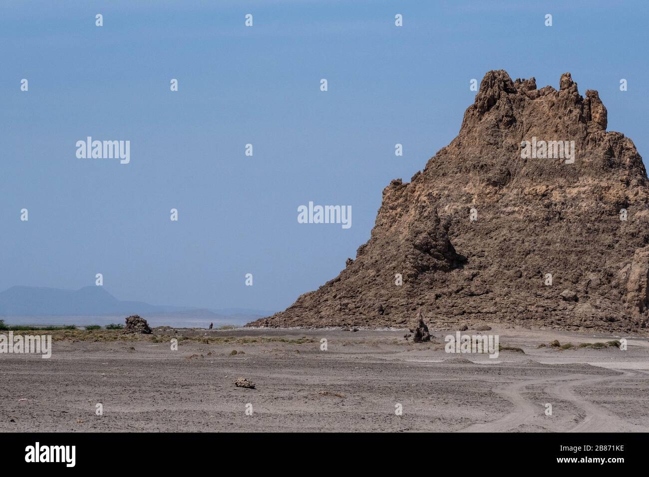 Africa, Djibouti, Lake Abbe. Landscape view of lake Abbe Two children ...