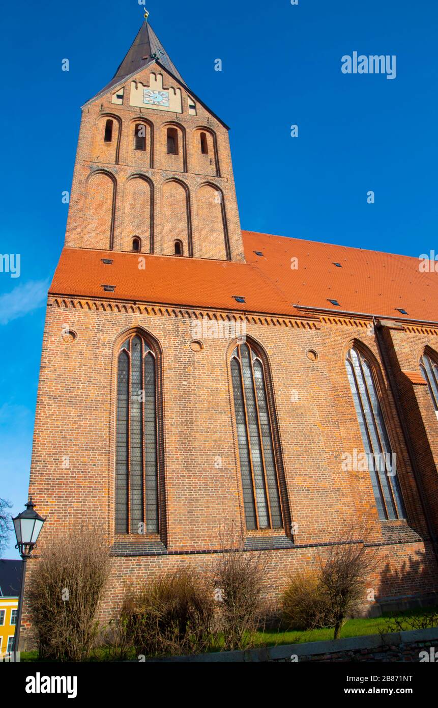brick church in northern Germany. View of church steeple. Typical ...
