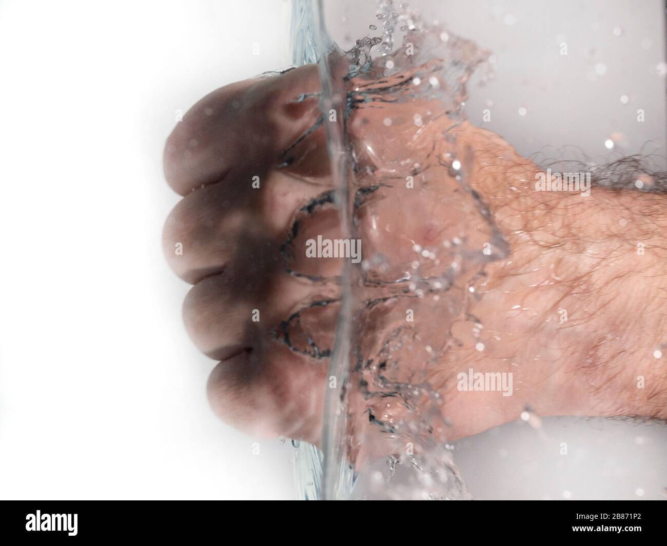 Fist hitting palm hi-res stock photography and images - Alamy
