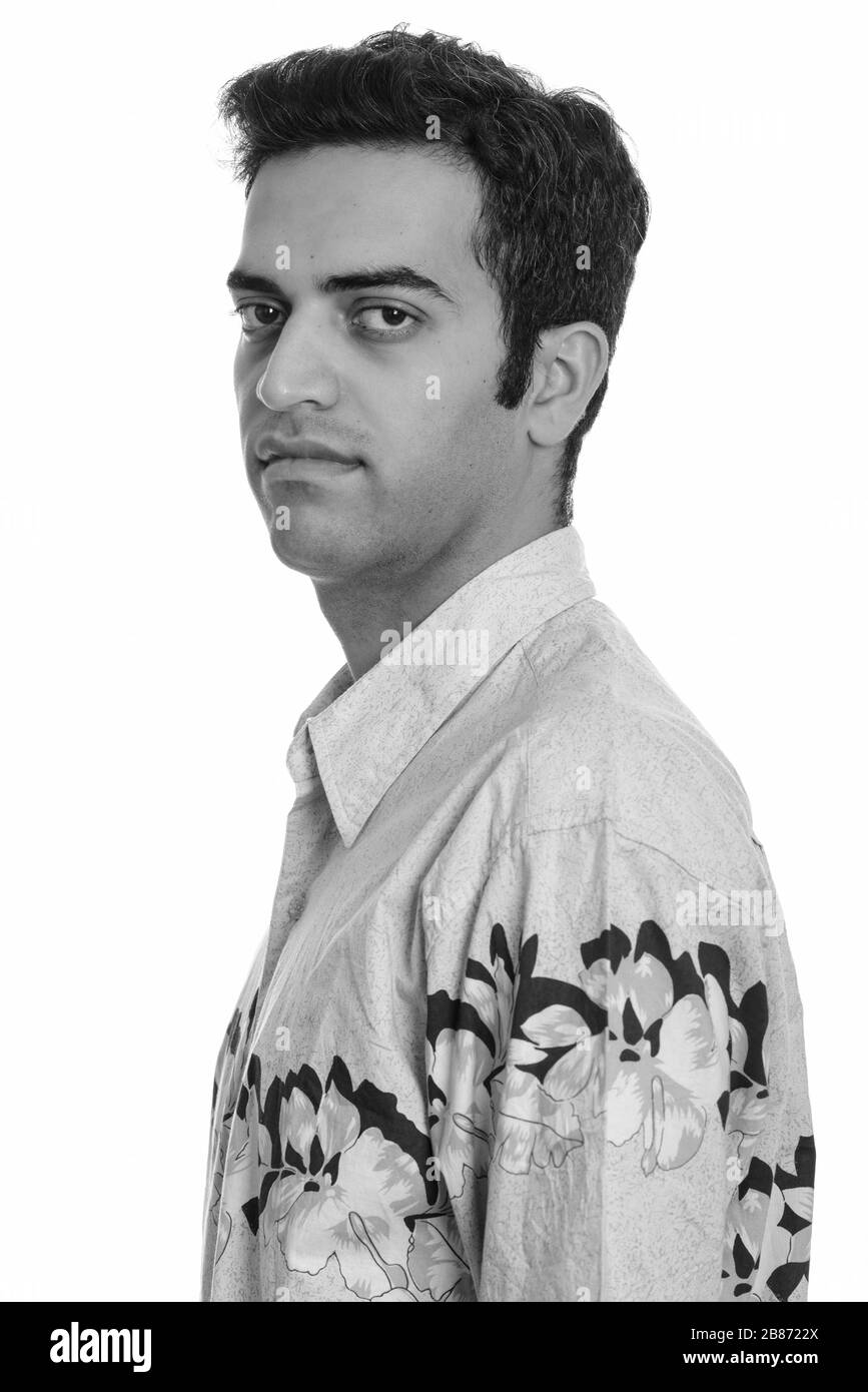 Profile view of young Persian tourist man ready for vacation Stock ...