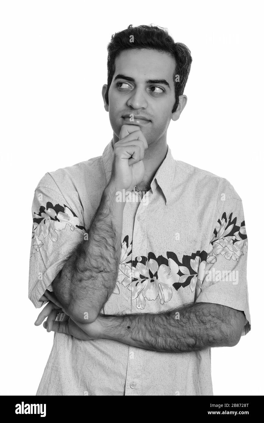 Portrait of young Persian tourist man thinking ready for vacation Stock ...