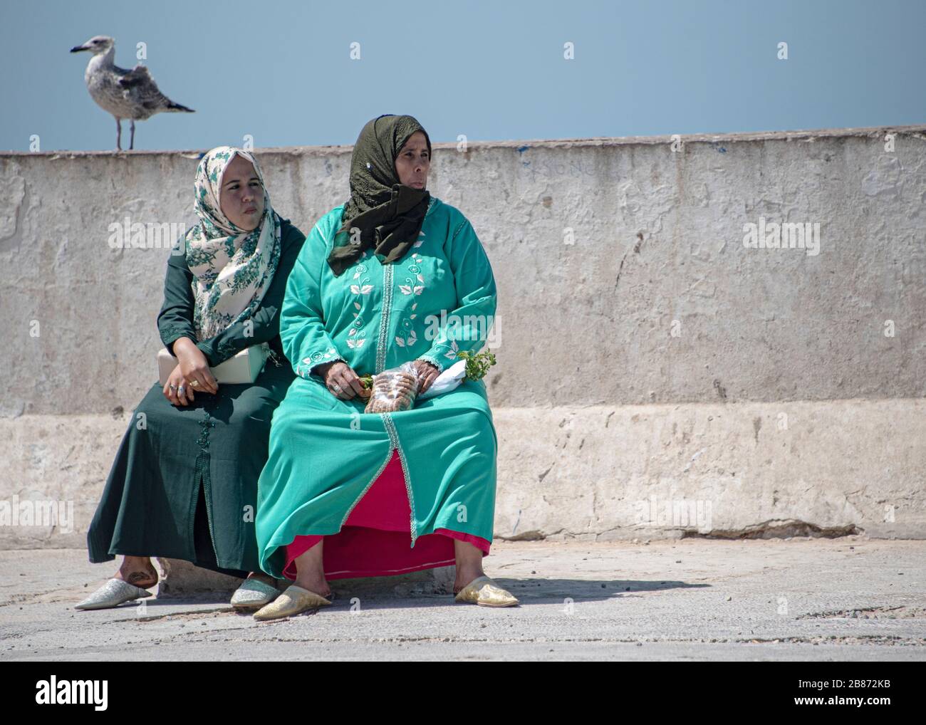 Essaouria, Morocco - September 2017: Mother and daughter, dressed in ...