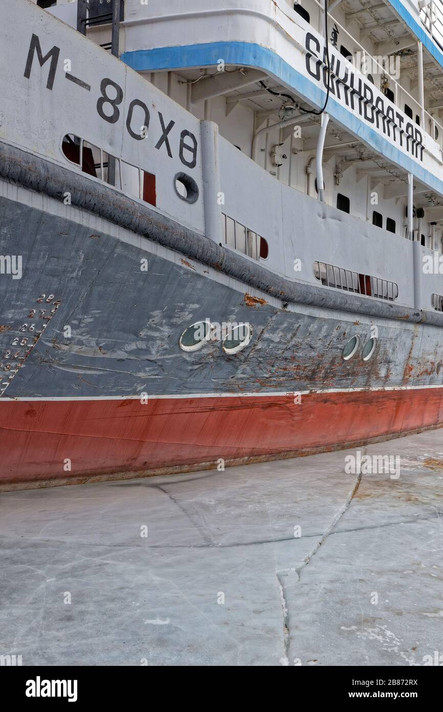 KHATGAL, MONGOLIA, February 23, 2020 : Old ships are caught in the ice ...