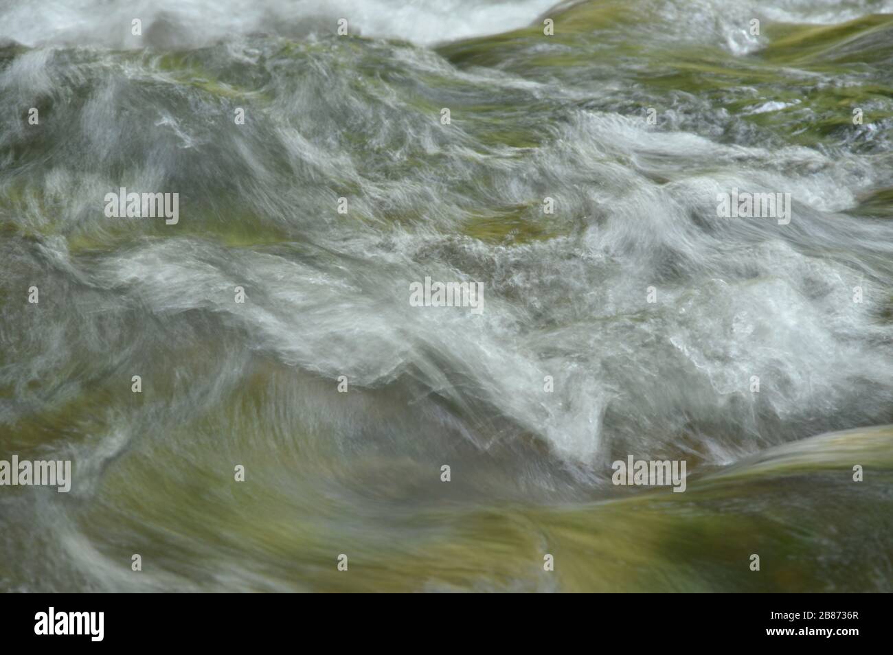 river flowing on cataract and water splashing Stock Photo - Alamy