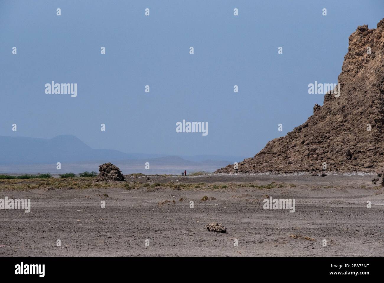 Africa, Djibouti, Lake Abbe. Landscape view of lake Abbe Two children ...
