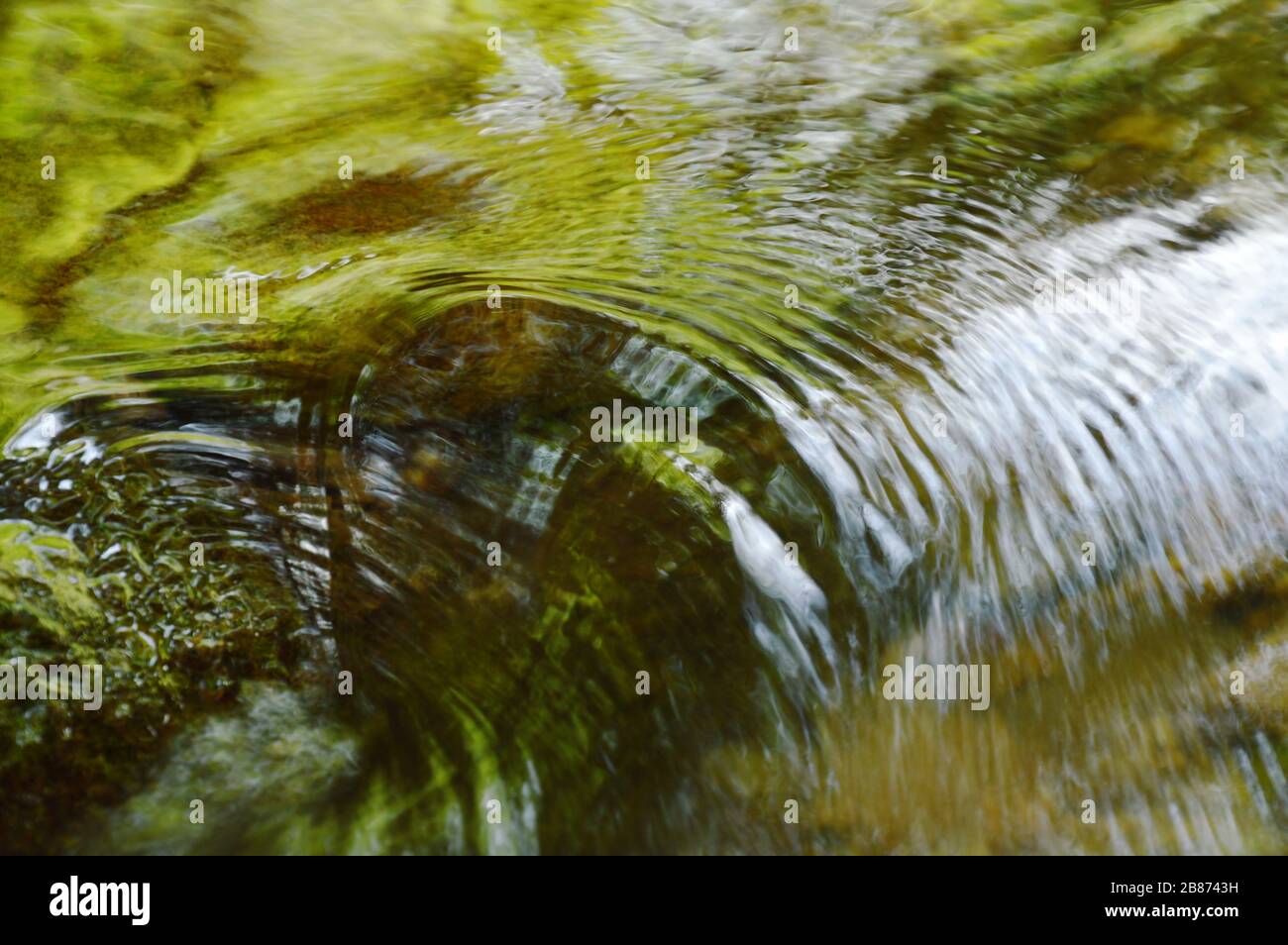 river flowing on cataract and water splashing Stock Photo - Alamy