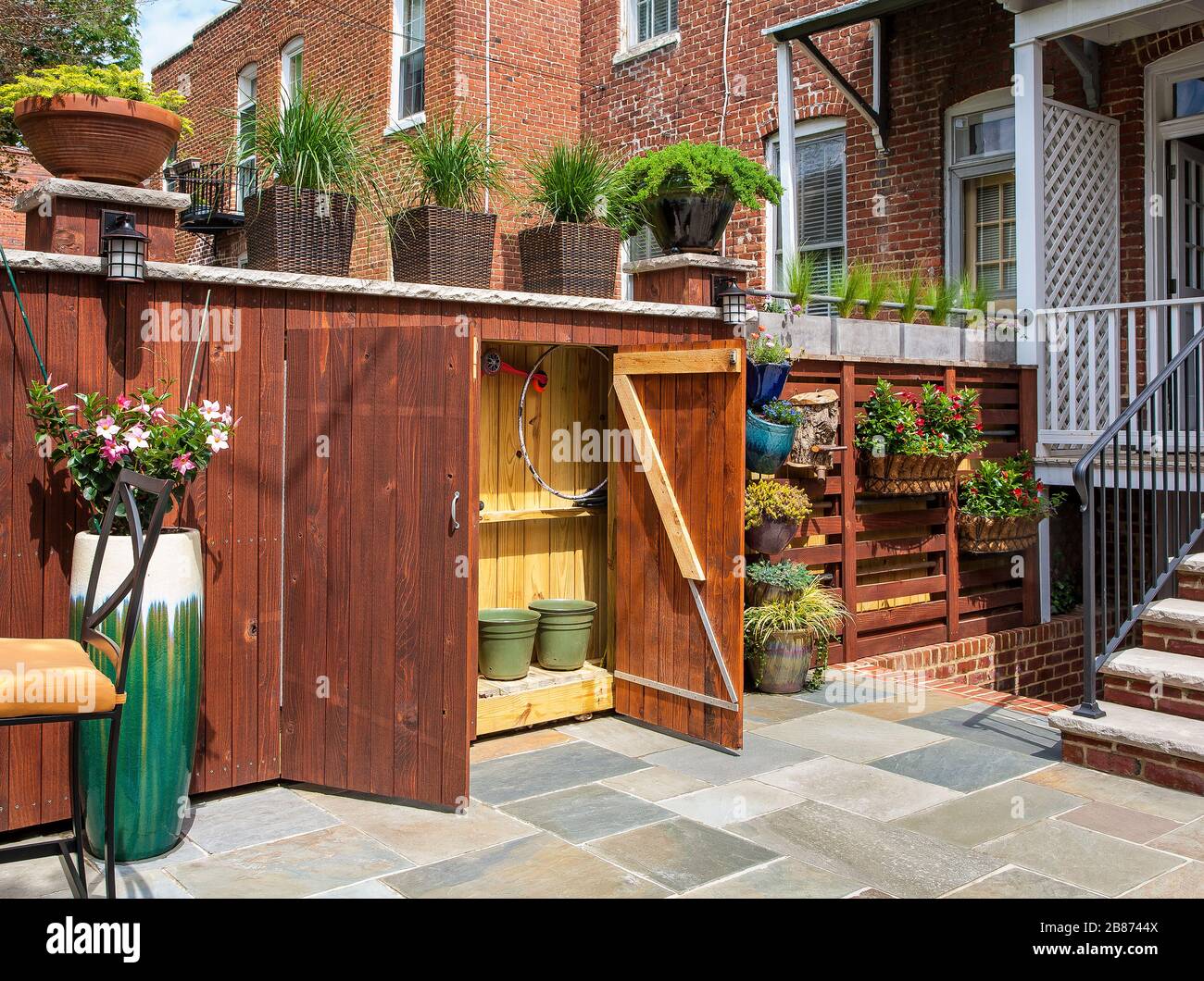 Urban deck garden design and storage Stock Photo - Alamy