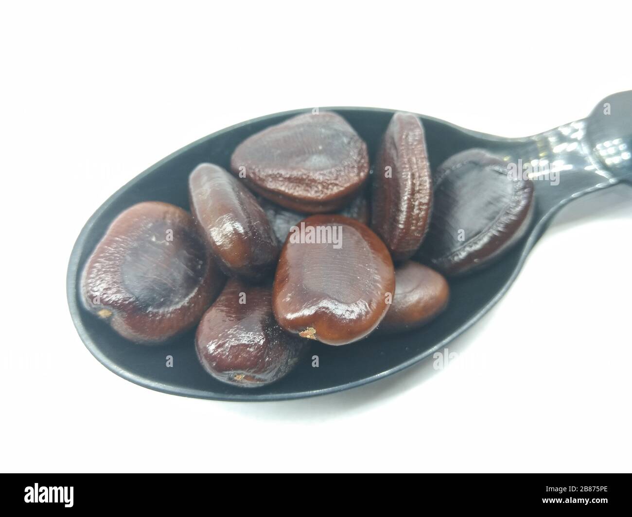 A picture of tamarind seeds Stock Photo - Alamy