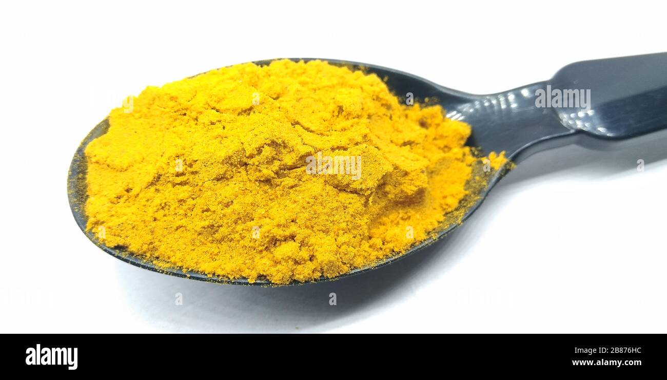 A picture of turmeric powder Stock Photo - Alamy