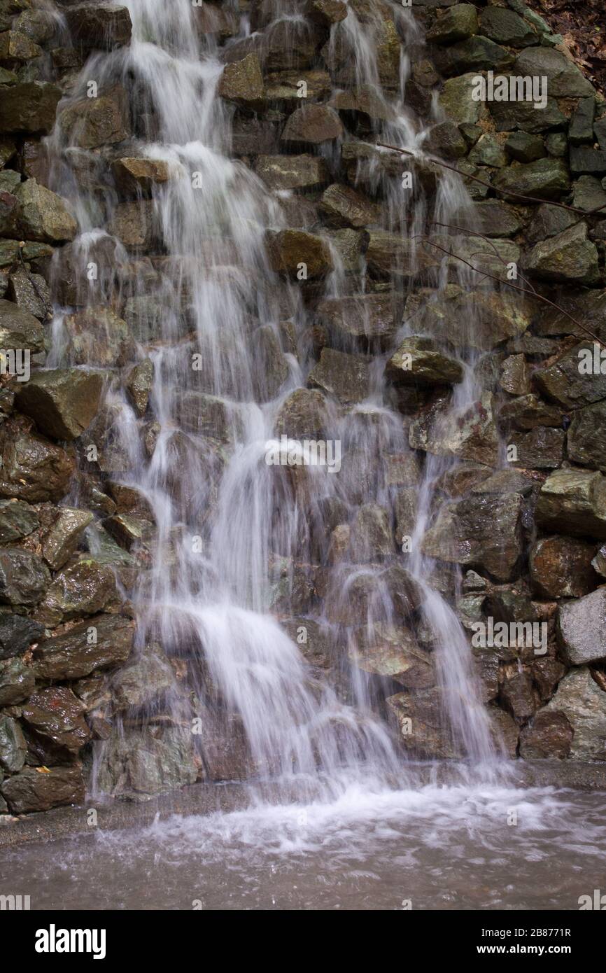 Water falling over rocks Stock Photo - Alamy