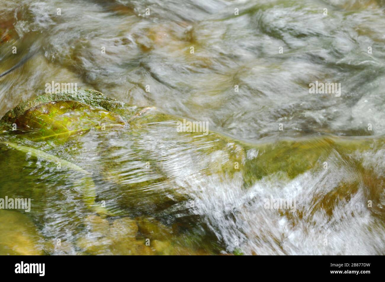 river flowing on cataract and water splashing Stock Photo - Alamy