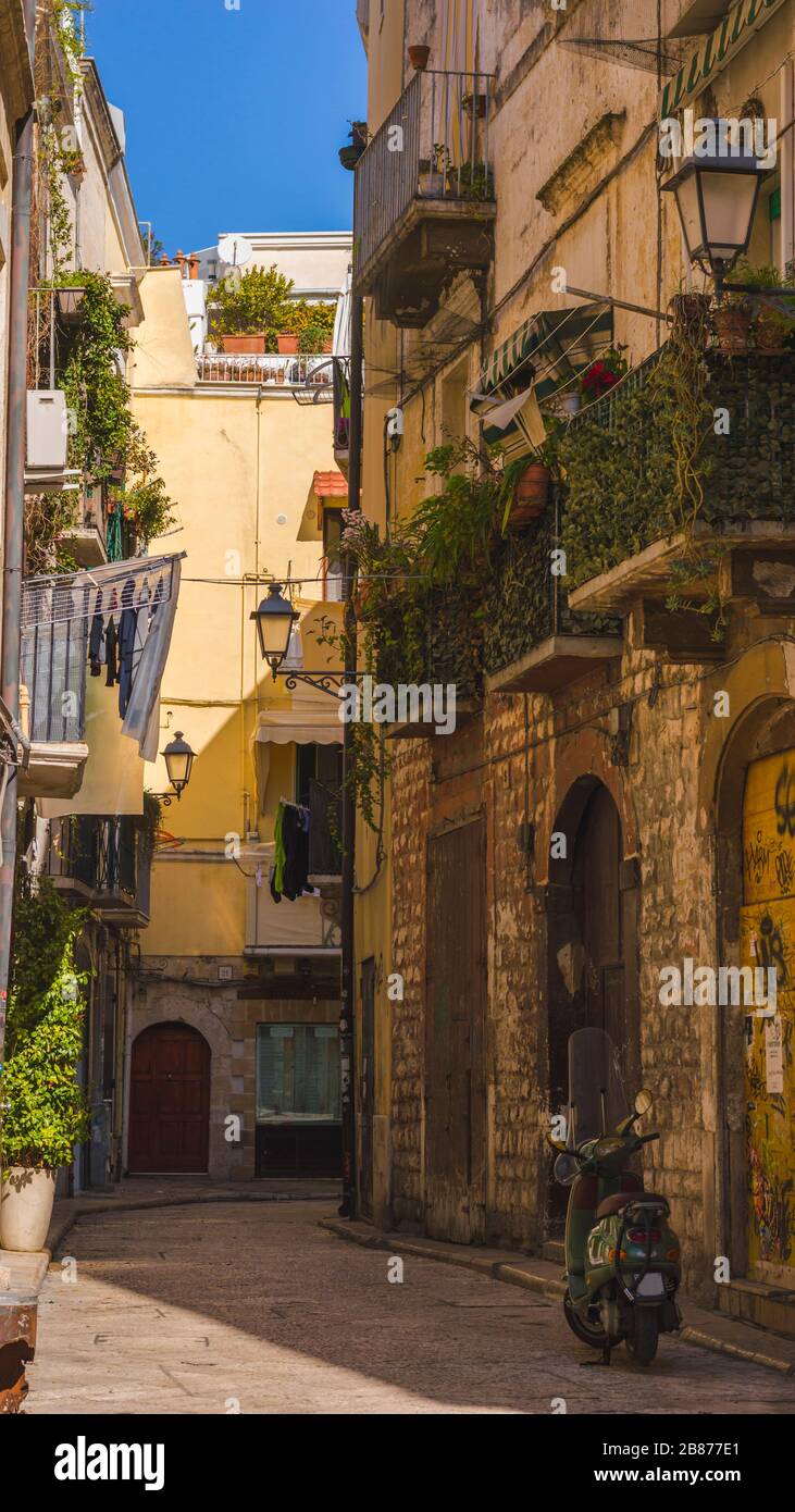 Old narrow street in historic center of Bari, italy Stock Photo - Alamy