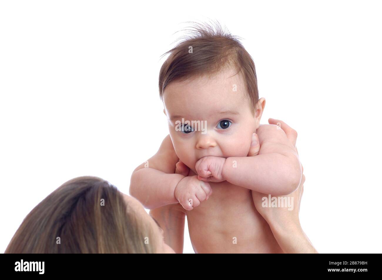 Loving mother hugging cute little baby girl. Family togetherness on ...