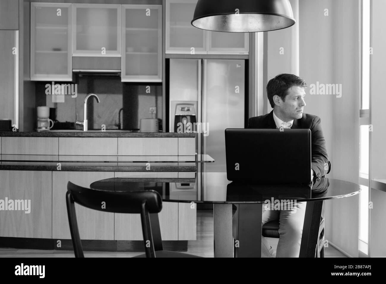 Side view men sitting dining hi-res stock photography and images - Alamy