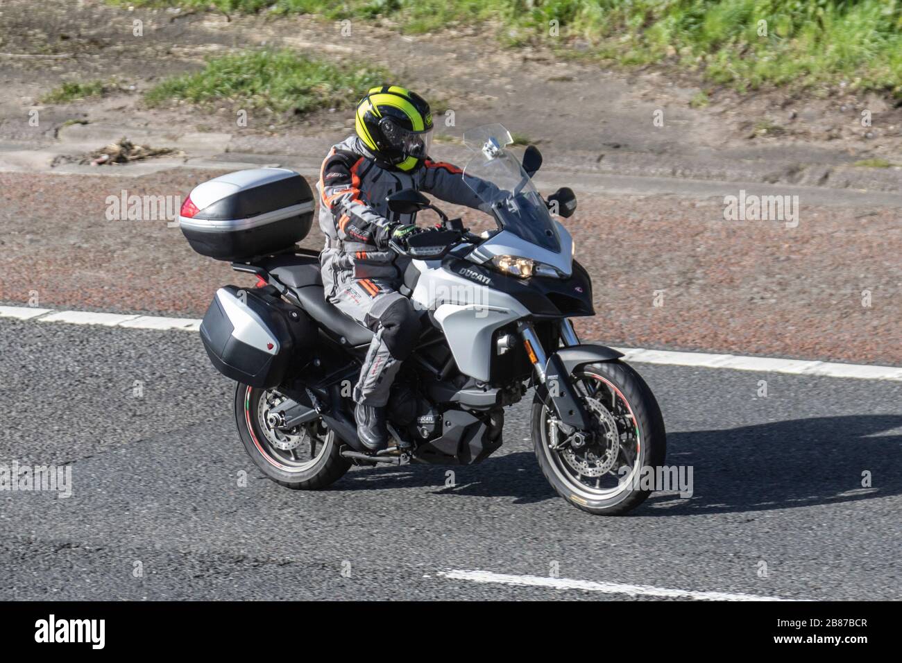 Ducati motorbike; Vehicular traffic, two wheeled transport, movement ...