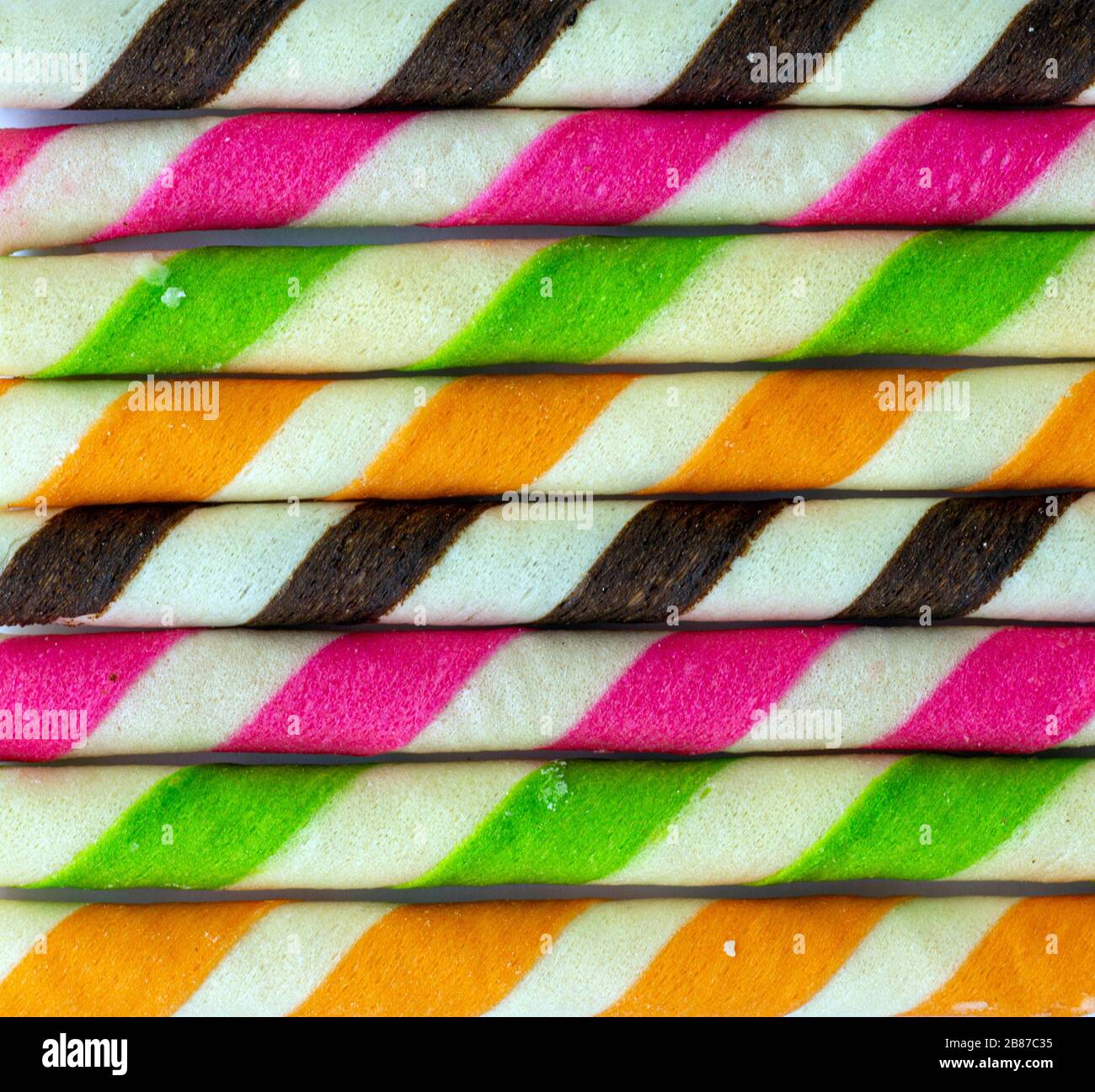 crispy rainbow snack roll with mix flavour on white background Stock ...