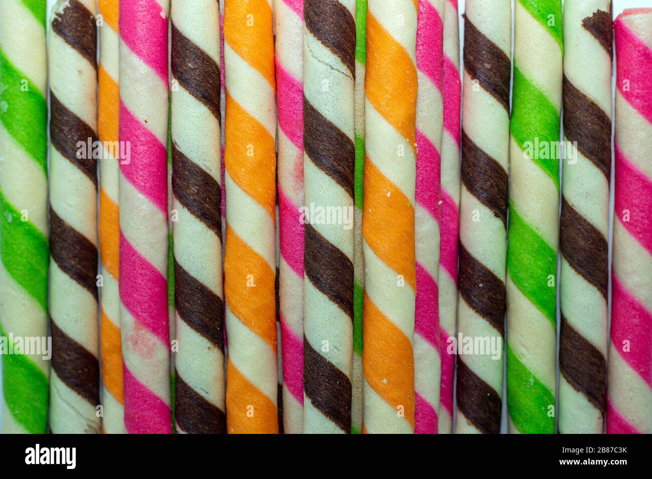 crispy rainbow snack roll with mix flavour on white background Stock ...
