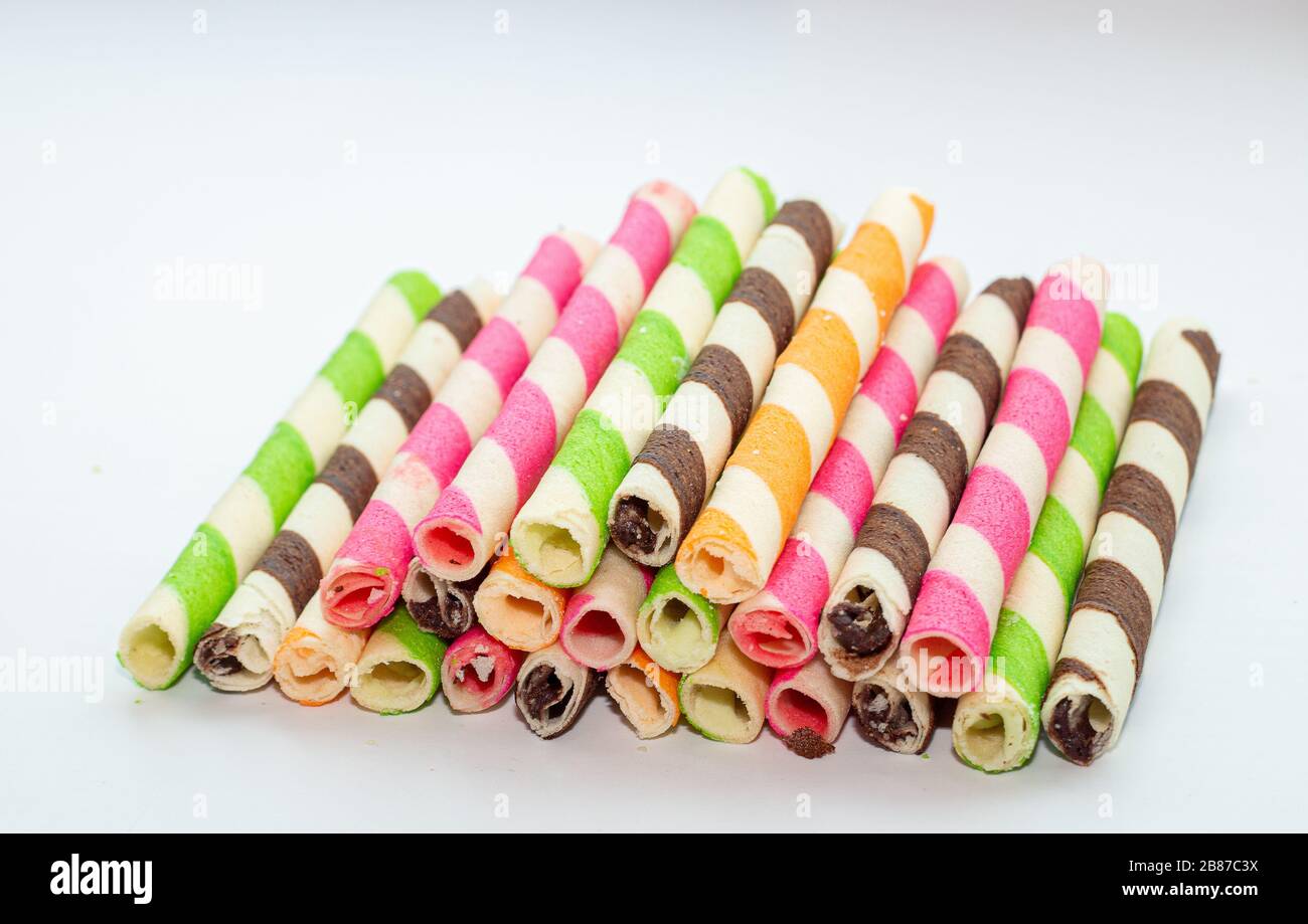 crispy rainbow snack roll with mix flavour on white background Stock ...